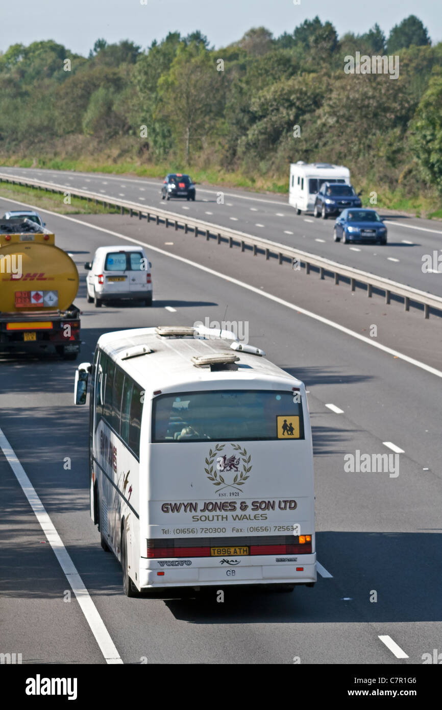 Bus or coach on motorway or road Stock Photo - Alamy