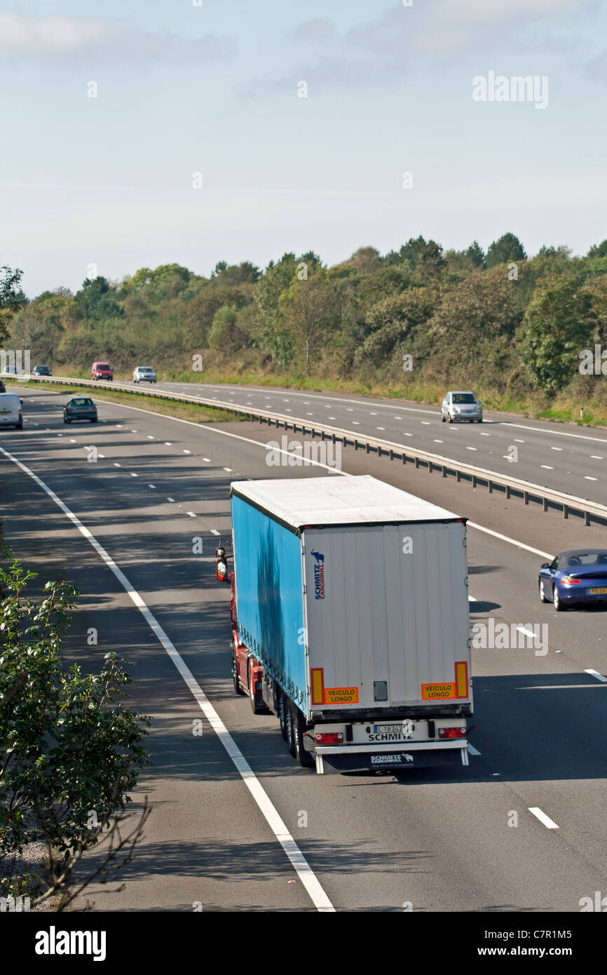 Lorries or trucks on a motorway or road Stock Photo - Alamy