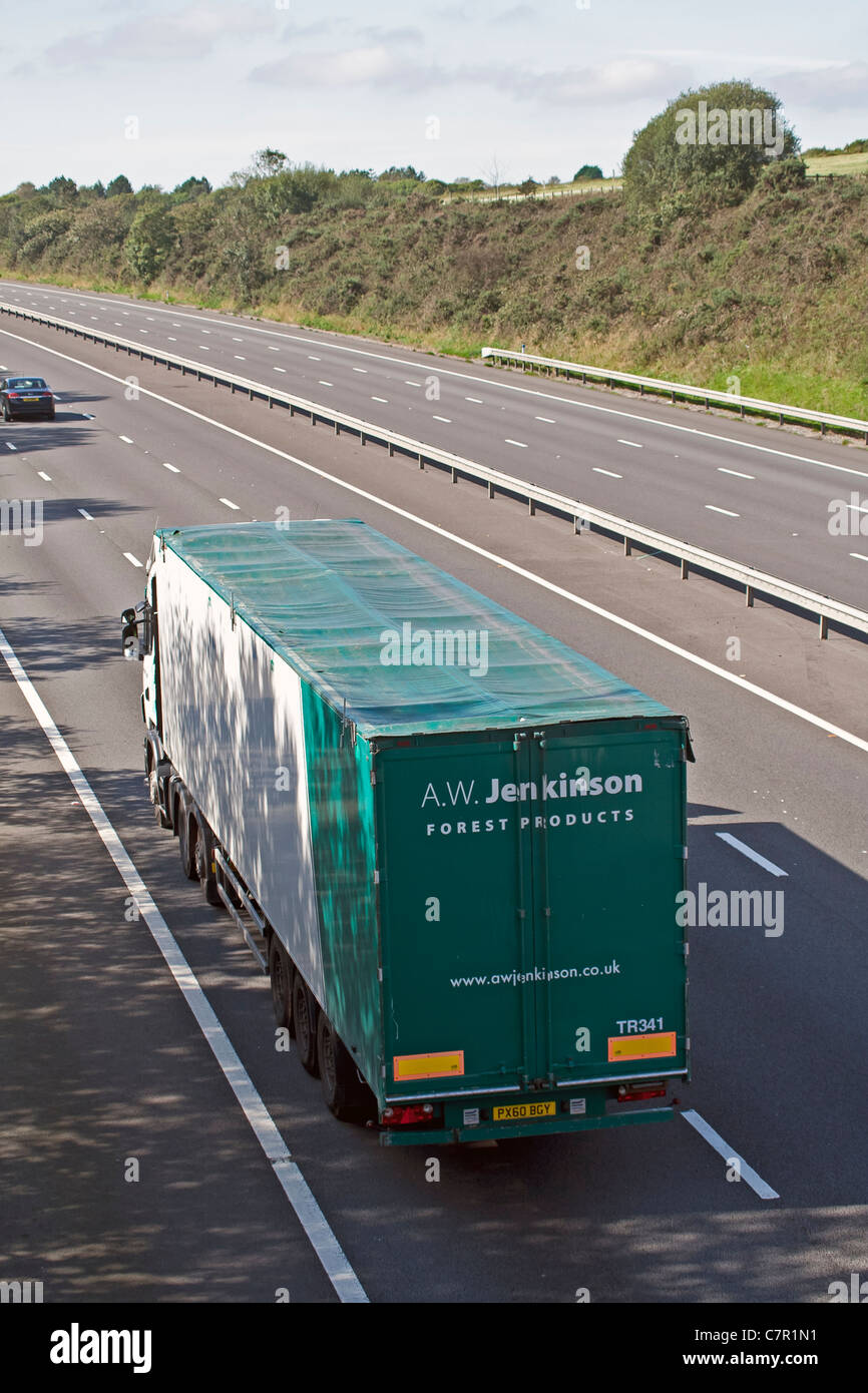 Lorries or trucks on a motorway or road Stock Photo - Alamy