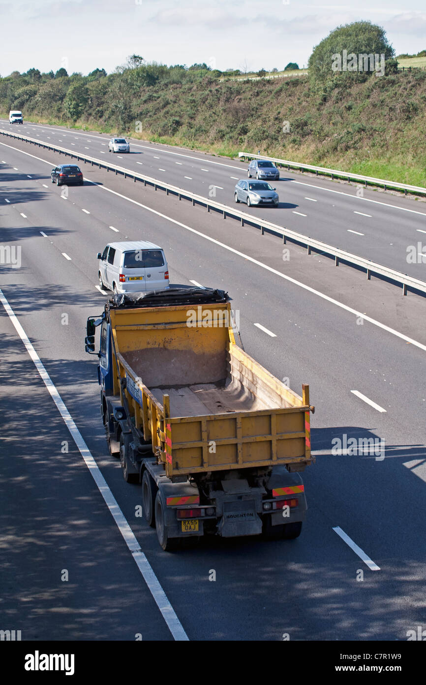 Lorries or trucks on a motorway or road Stock Photo - Alamy