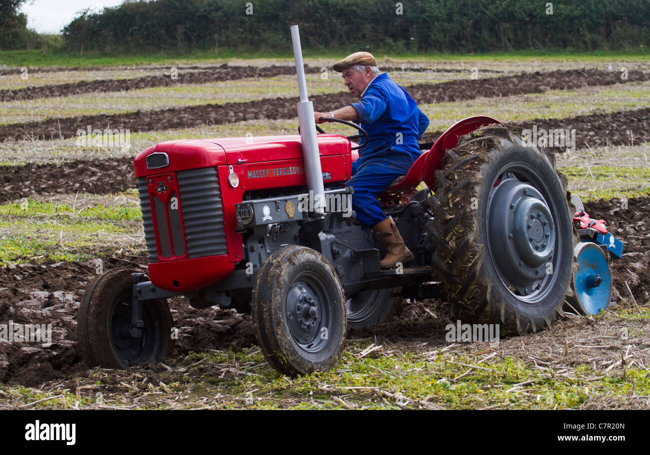 Side view of tractor with plough hi-res stock photography and images ...