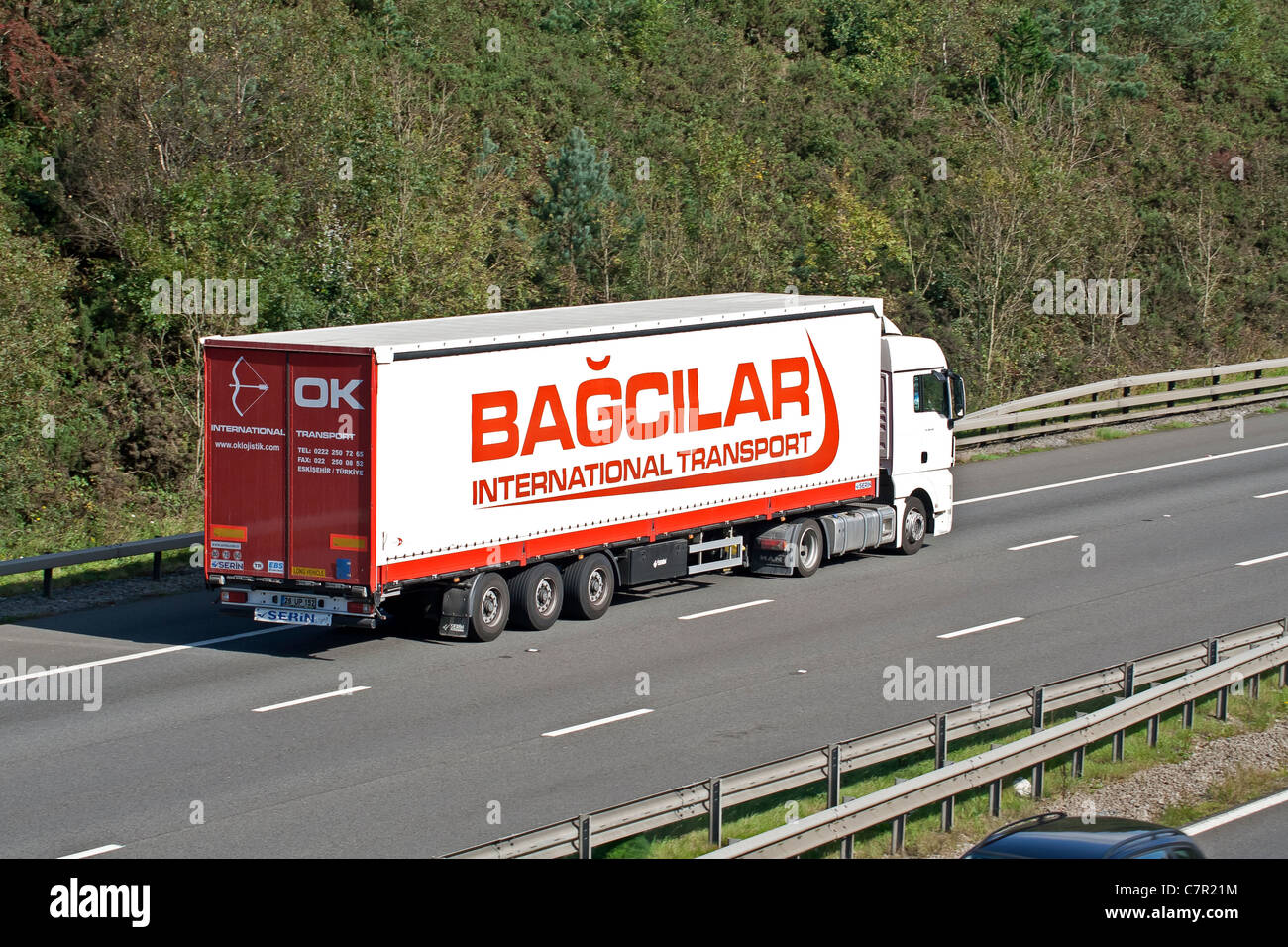 Lorries or trucks on a motorway or road Stock Photo - Alamy