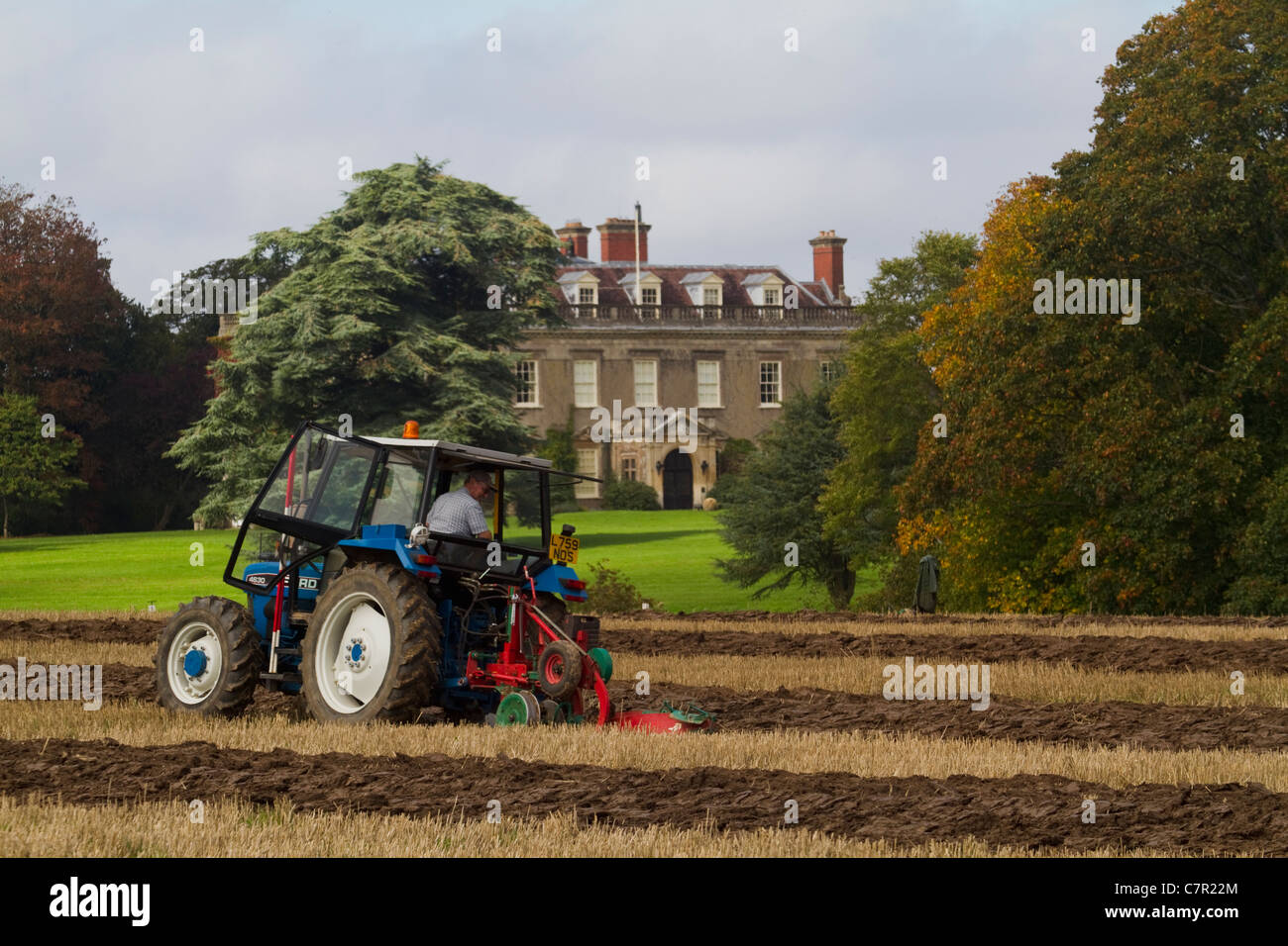 Tractor ploughing in the British Countryside Stock Photo - Alamy