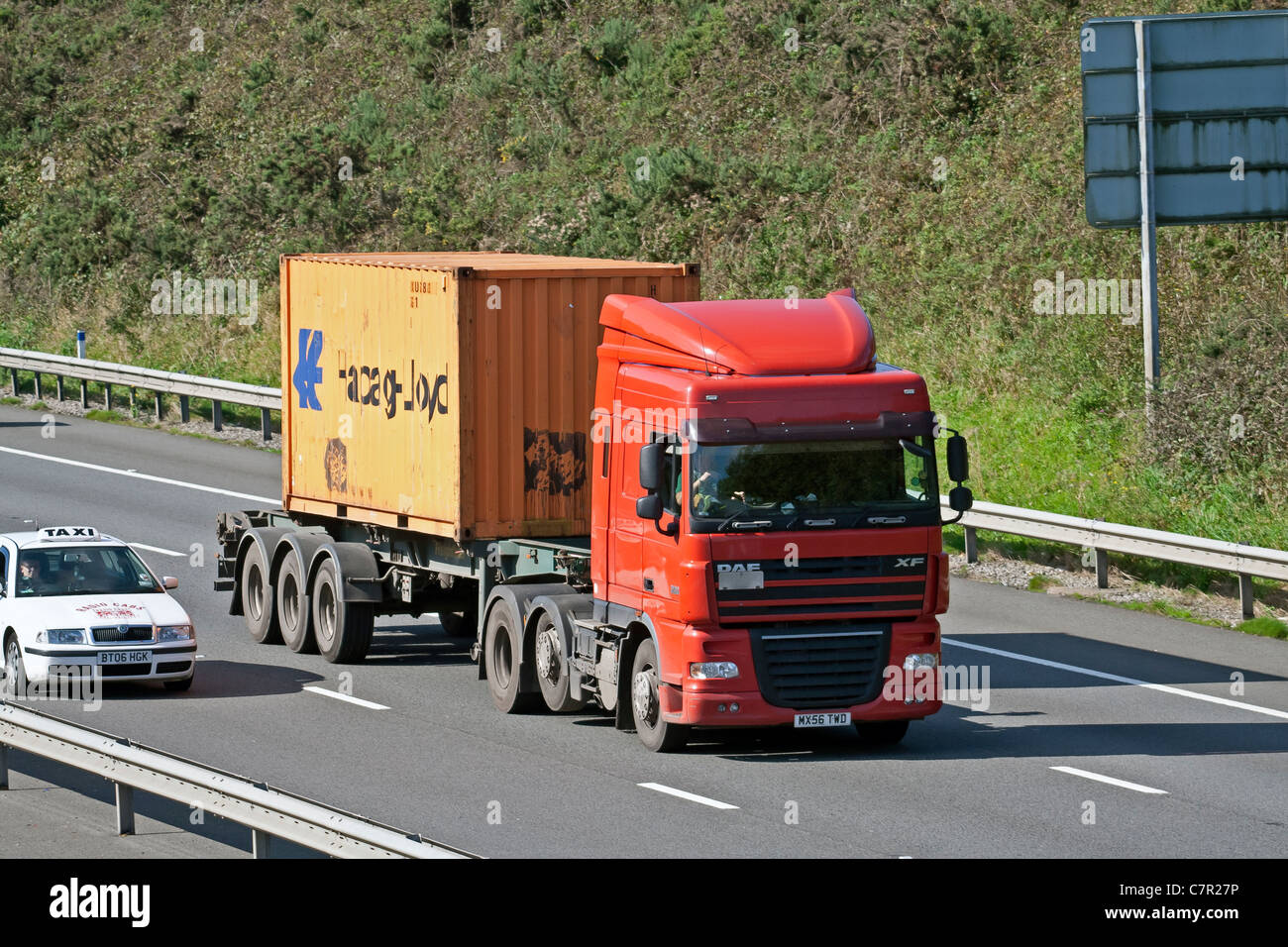 Lorries or trucks on a motorway or road Stock Photo - Alamy
