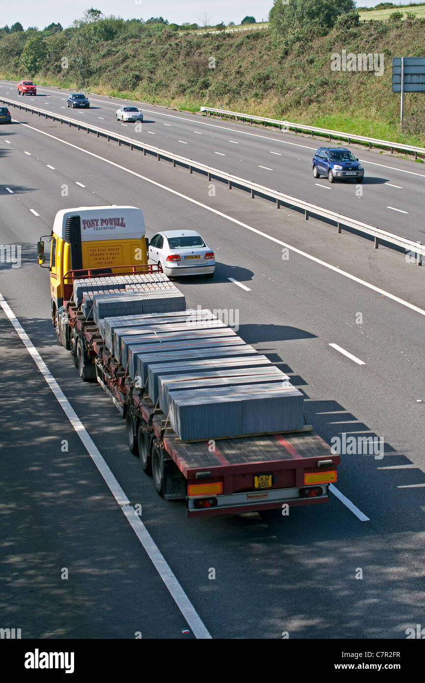 Lorries or trucks on a motorway or road Stock Photo - Alamy