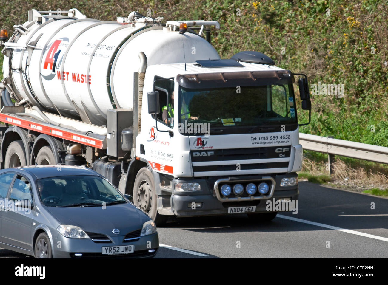 Tanker truck or lorry on road or motorway Stock Photo - Alamy