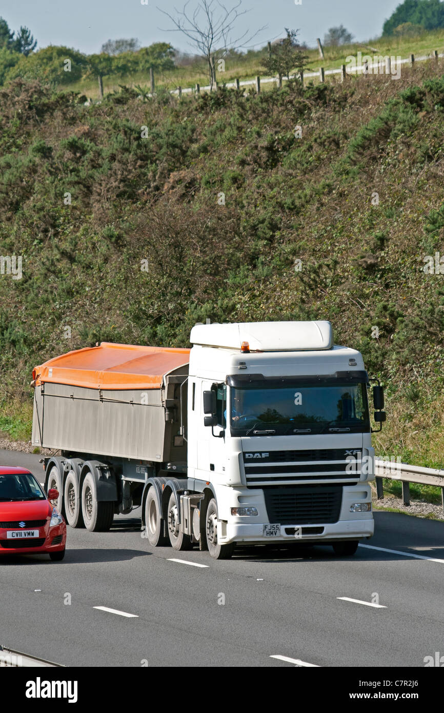 Lorries or trucks on a motorway or road Stock Photo - Alamy
