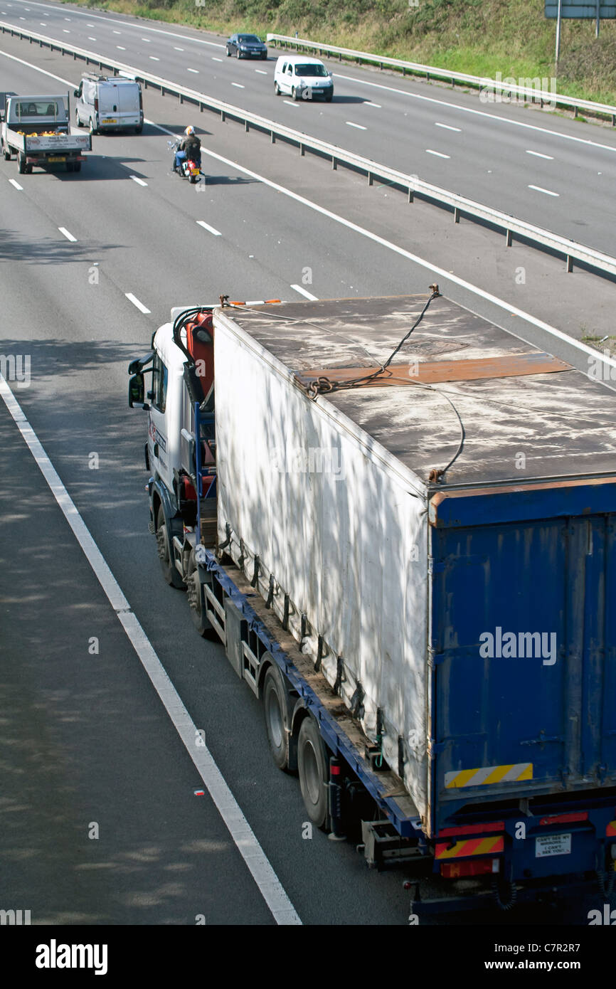 Lorries and trucks travel along the M4 motorway in South Wales, a key ...