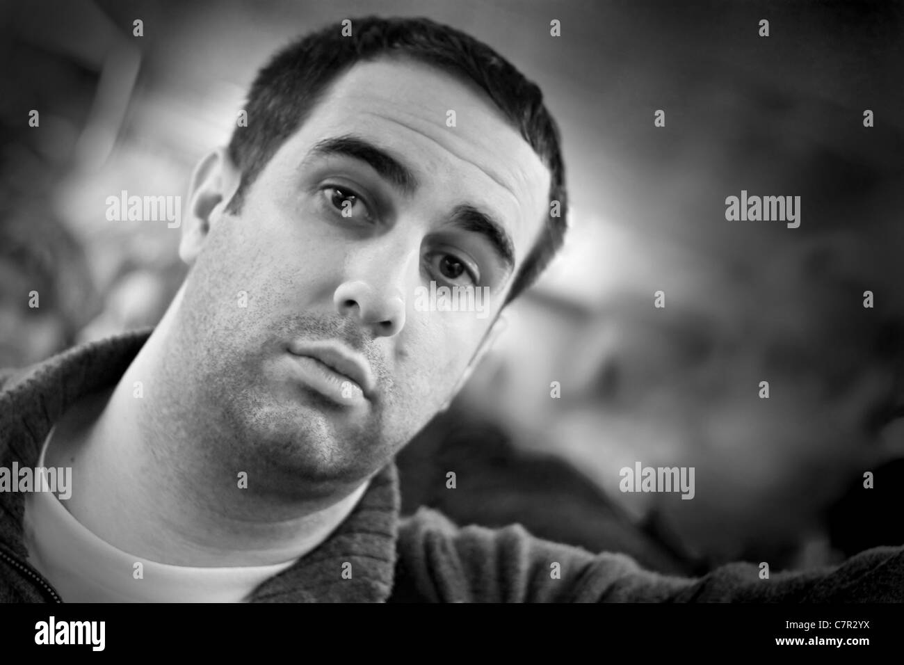 A serious young man in black and white Stock Photo - Alamy