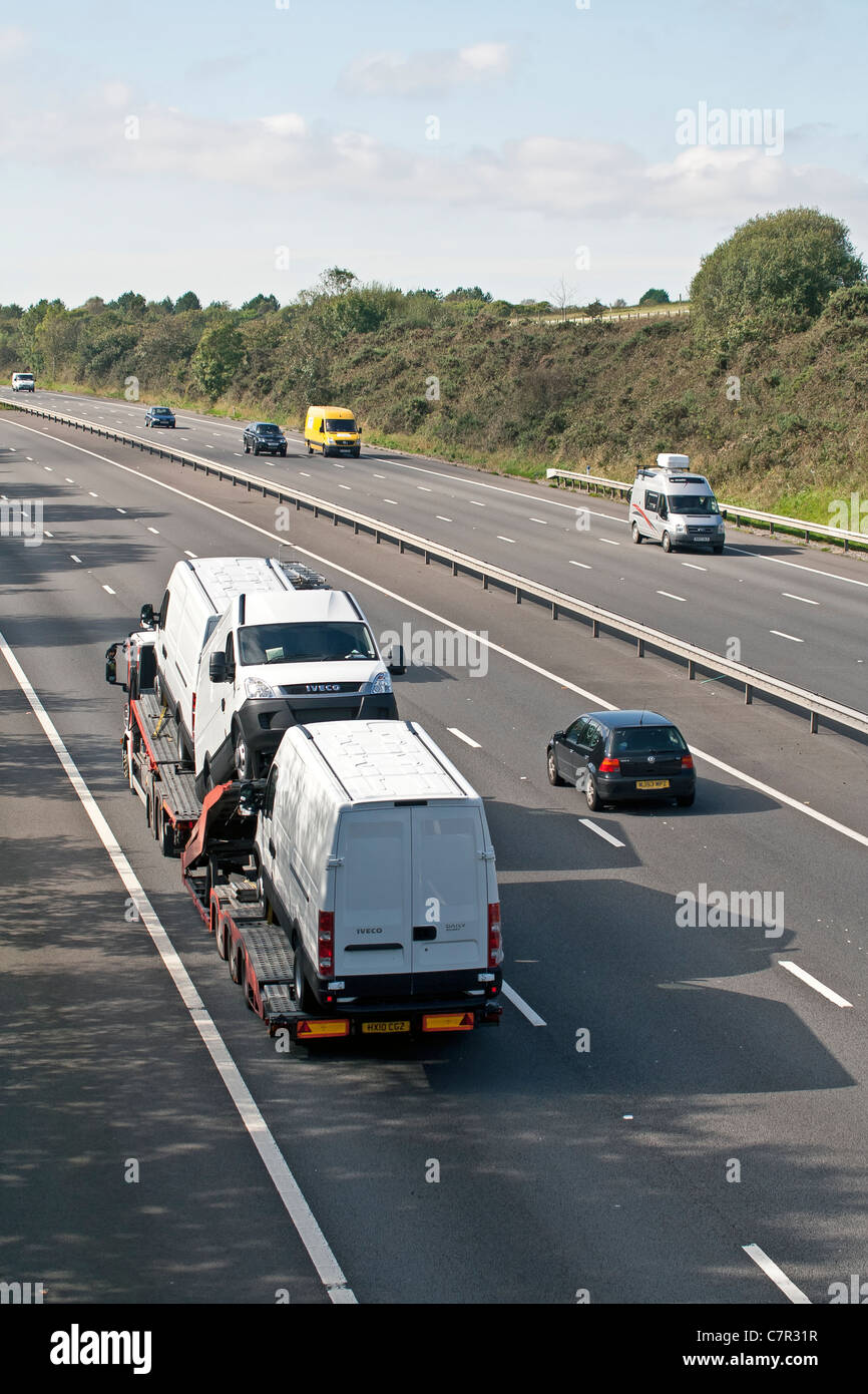 Lorries or trucks on a motorway or road Stock Photo - Alamy