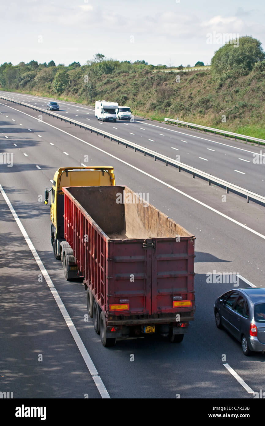 Lorries or trucks on a motorway or road Stock Photo - Alamy