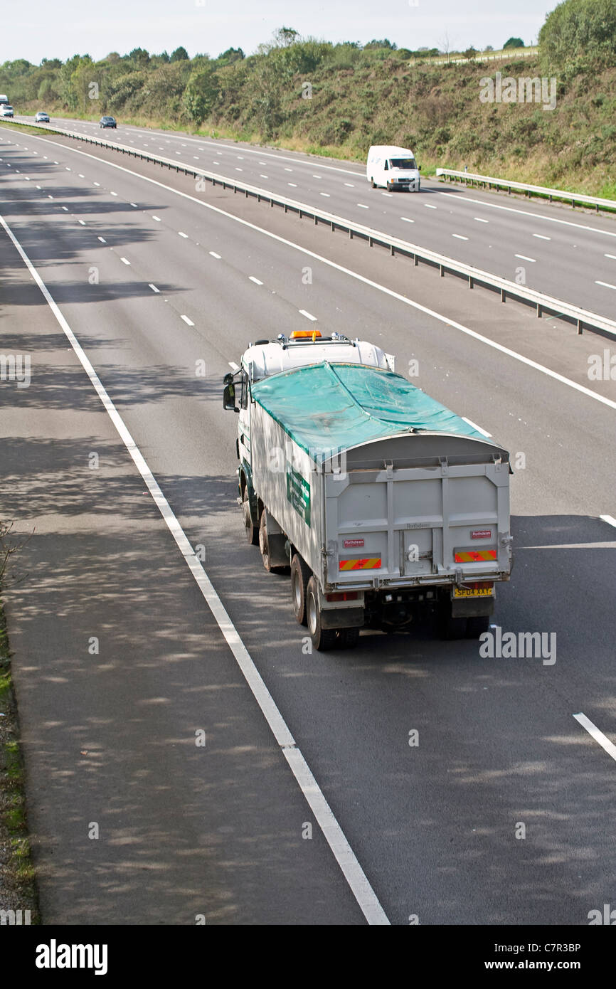 Lorries or trucks on a motorway or road Stock Photo - Alamy