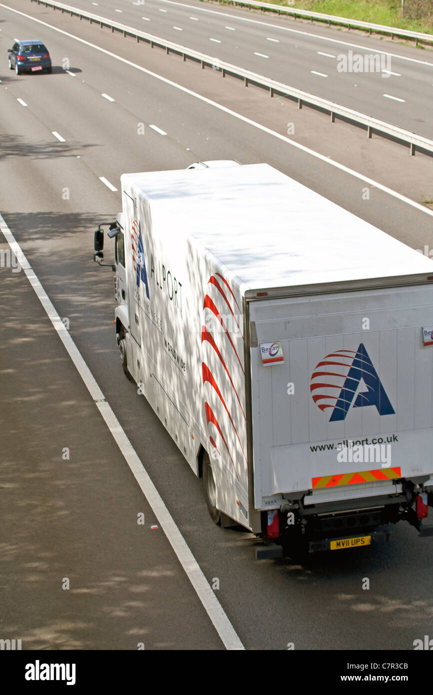 Lorries or trucks on a motorway or road Stock Photo - Alamy