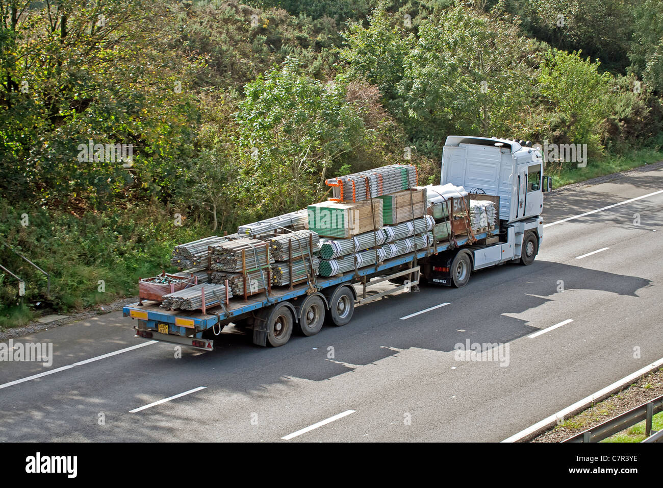 Lorries, trucks, and vans travel along the M4 motorway in South Wales ...
