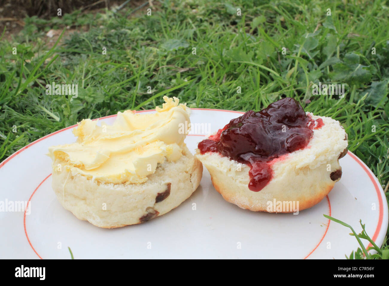 Cream and jam scone Stock Photo - Alamy