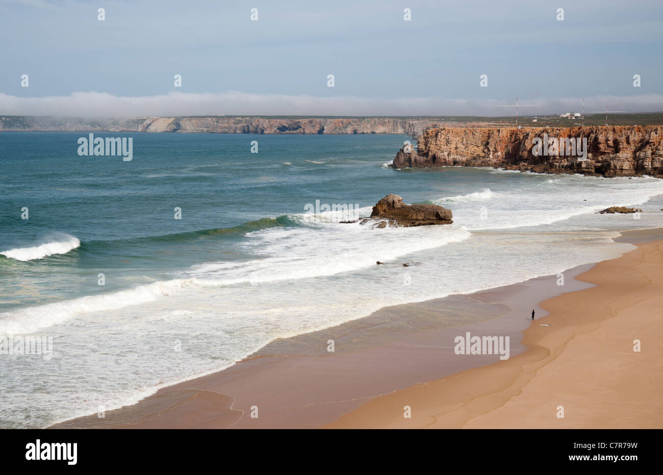Surfer watching waves at Tonel beach, Portugal Stock Photo - Alamy
