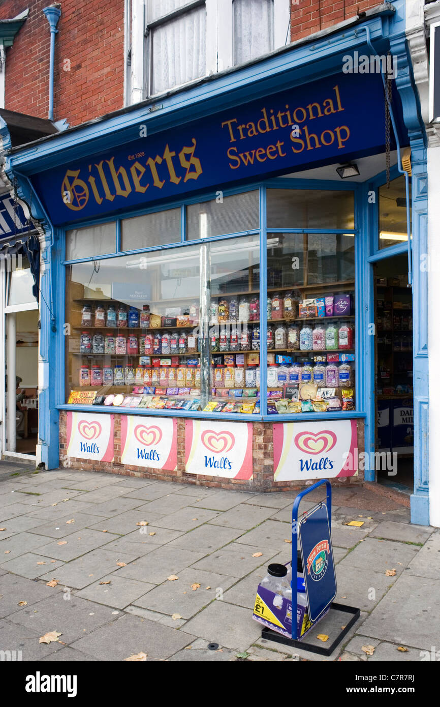 traditional jars of sweets in a traditional sweet shop viewed from the ...