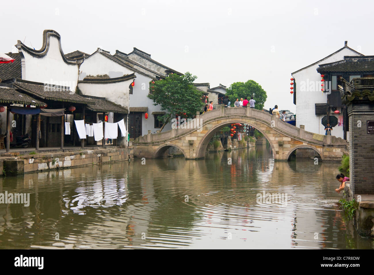 Old residence and stone bridge on the Grand Canal, Xitang, Zhejiang ...