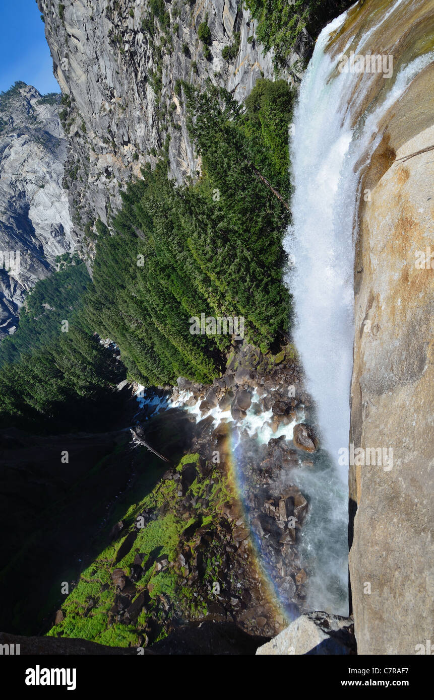 Vernal Fall drops hundreds of feet over a cliff. Yosemite National Park ...