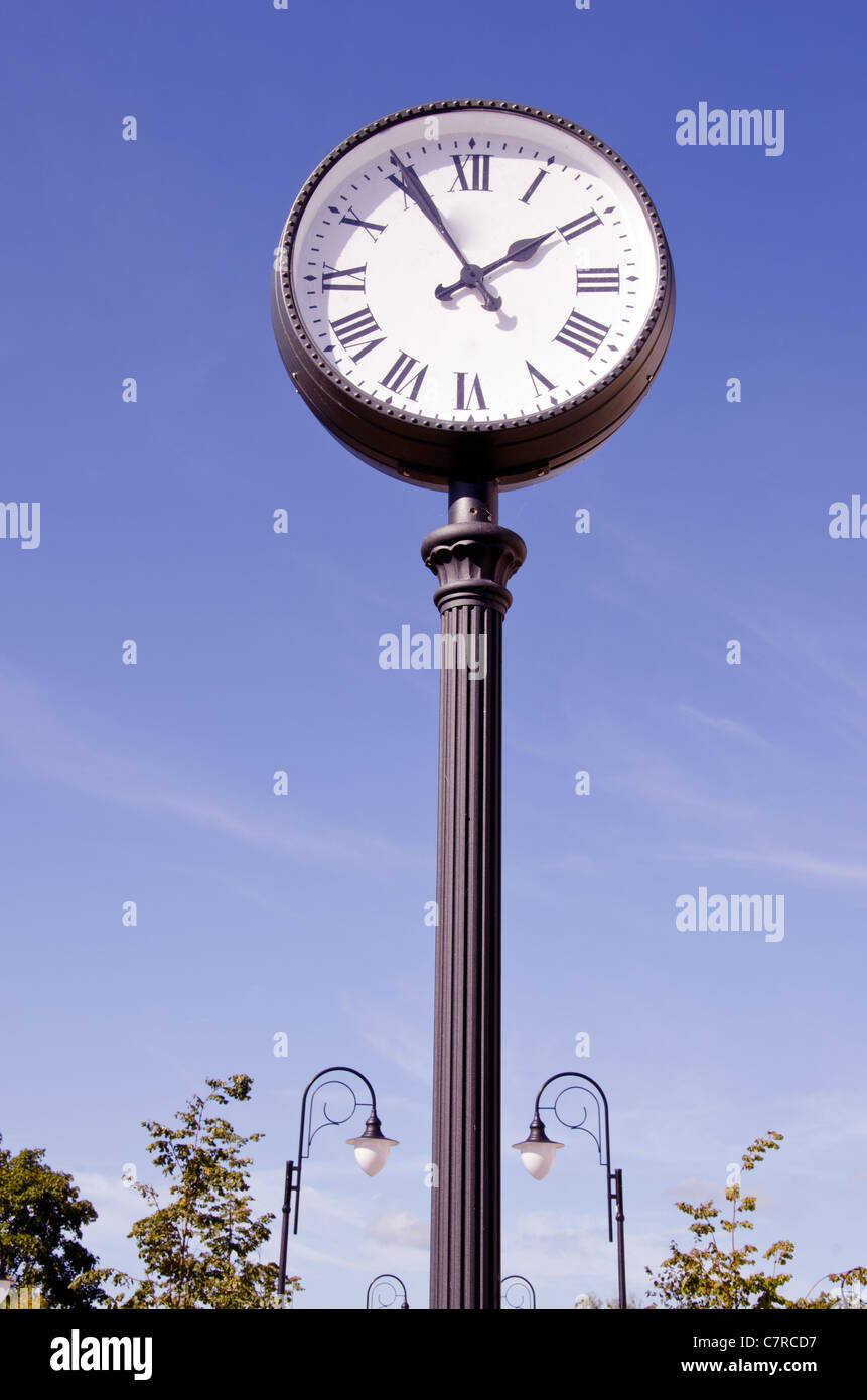 street clock and two lamps on sky background Stock Photo - Alamy