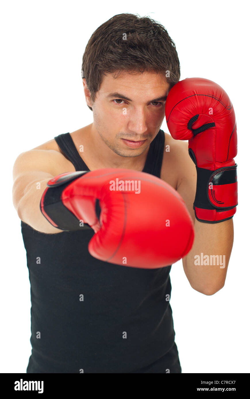 Serious boxer man with boxing gloves training isolated on white ...