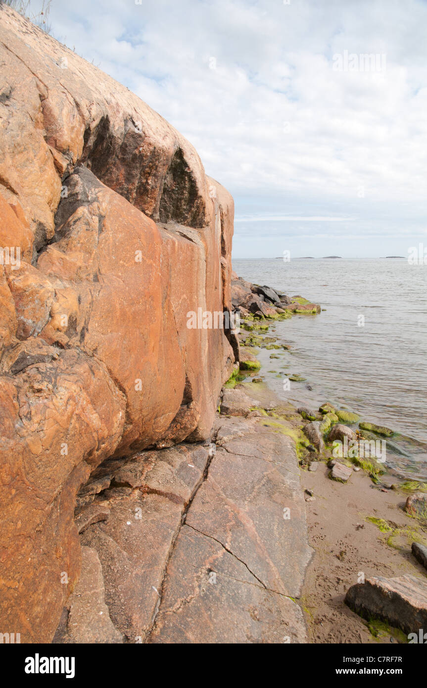 red cliff by the sea Stock Photo - Alamy