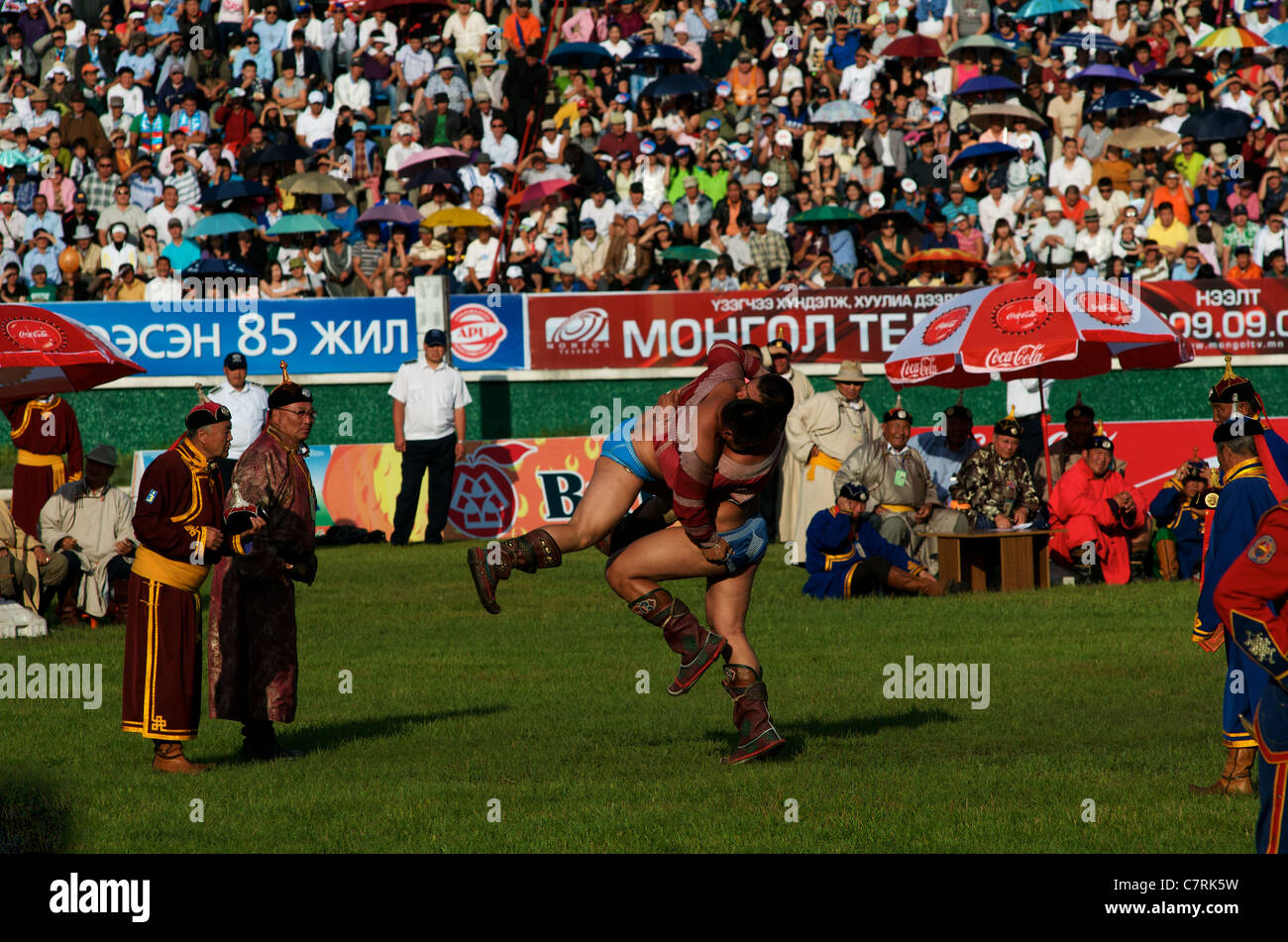 Mongolian wrestlers during dramatic takedown, Naadam Festival, National ...