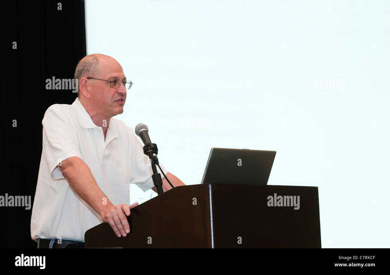 Man speaking in conference room Stock Photo - Alamy