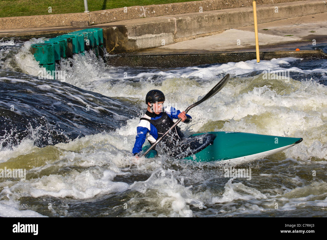 Young male practicing white water kayaking, National Water Sports ...