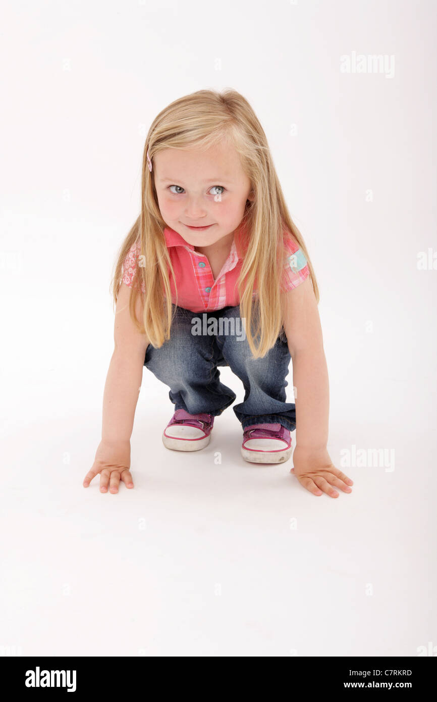 Young girl getting ready to jump Stock Photo - Alamy