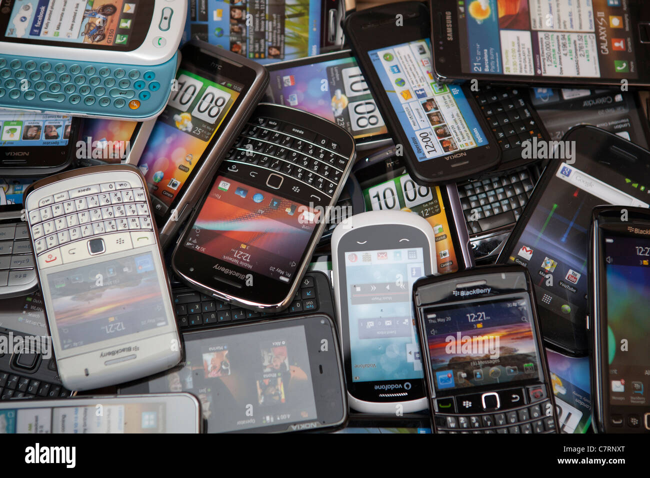 Pile of smart phones Stock Photo - Alamy