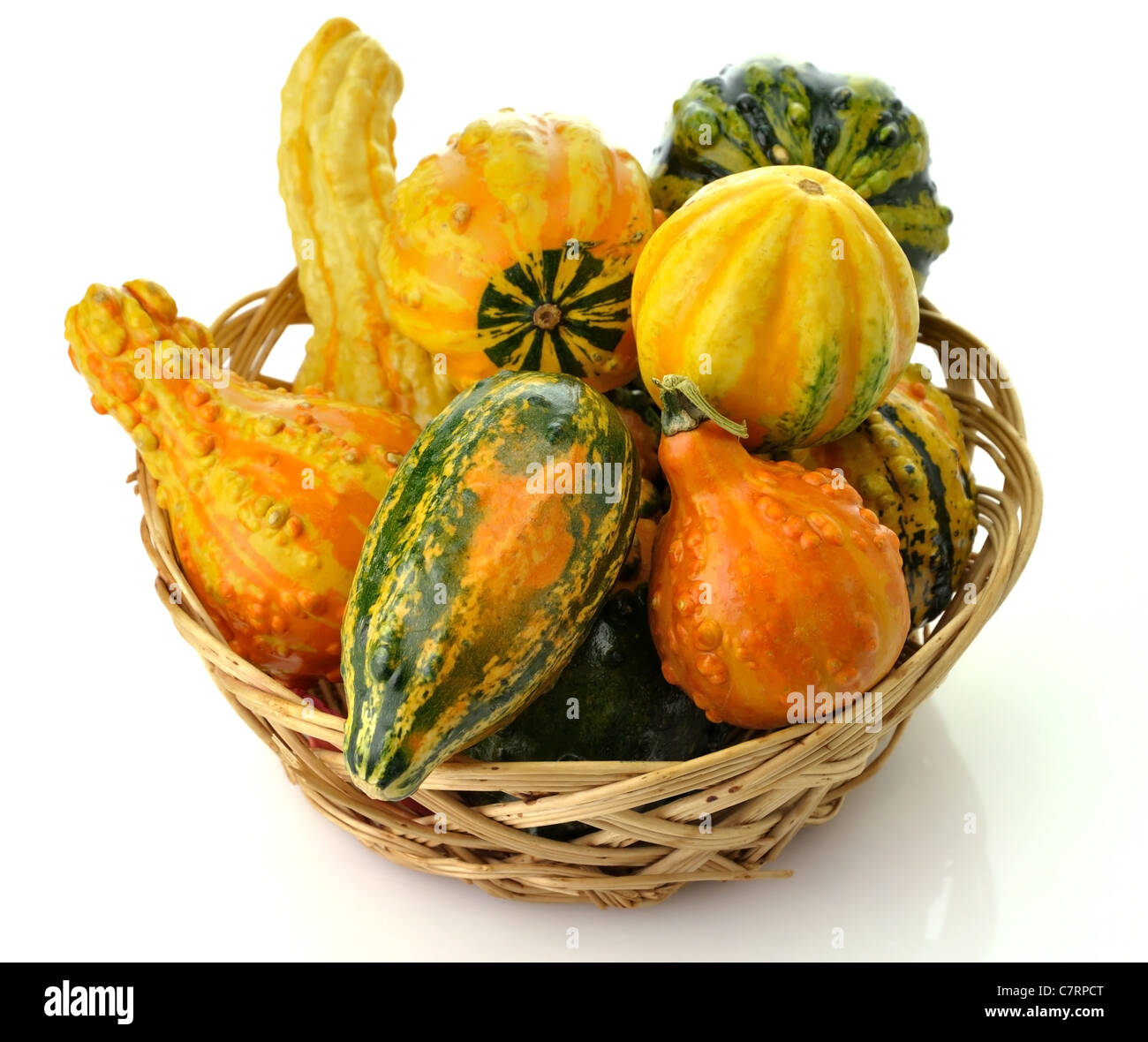 Small Colorful Gourds Collection In A Basket Stock Photo - Alamy