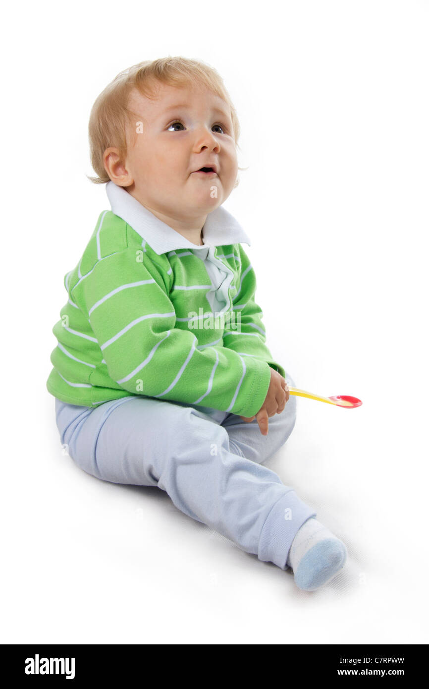Portrait of sitting down small child Isolated on white Stock Photo - Alamy