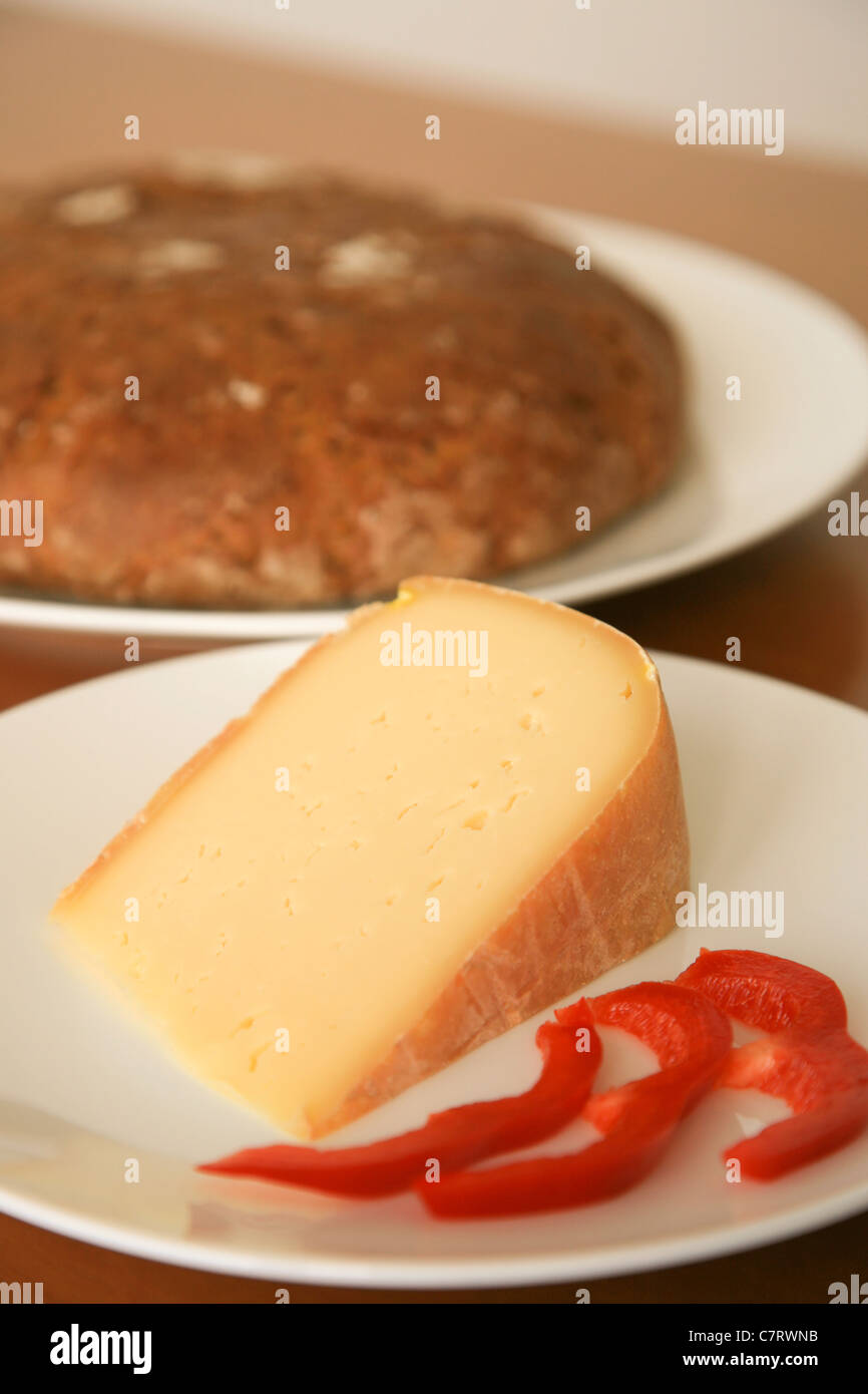 A slice of Swiss cheese and brown bread Stock Photo - Alamy