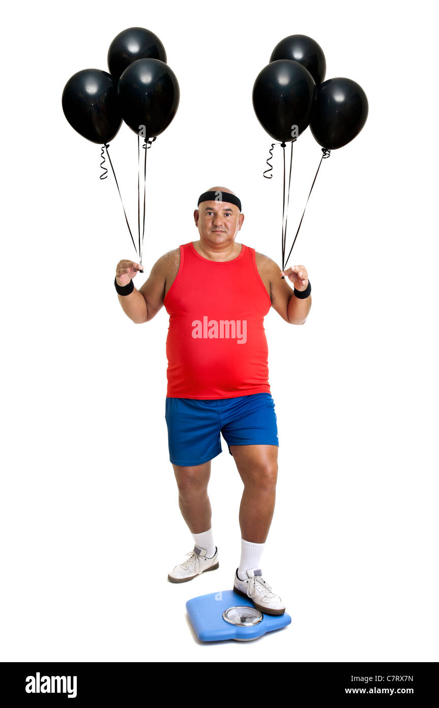 Large fitness man with weight scale and balloons isolated in white ...