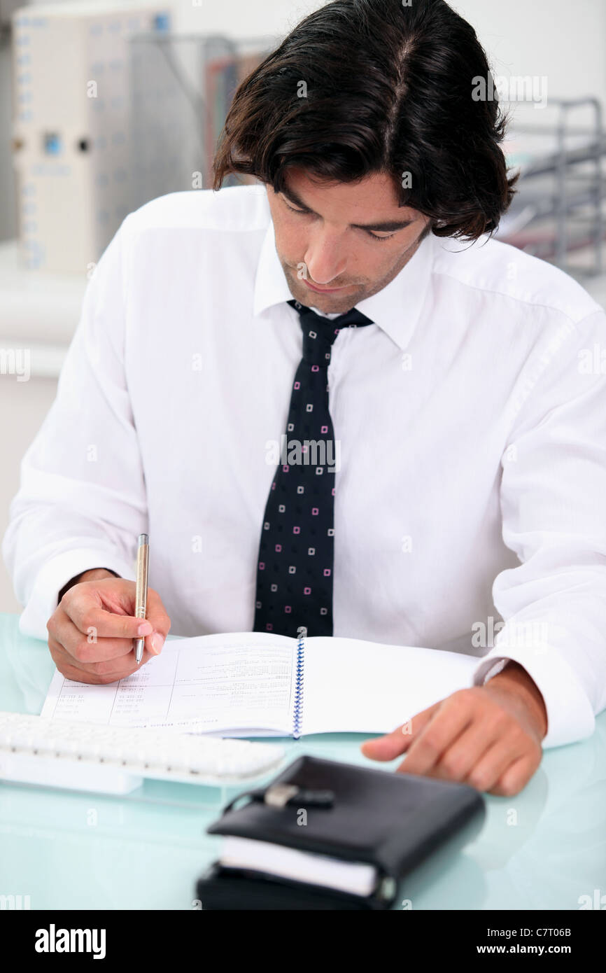 office worker reading Stock Photo - Alamy