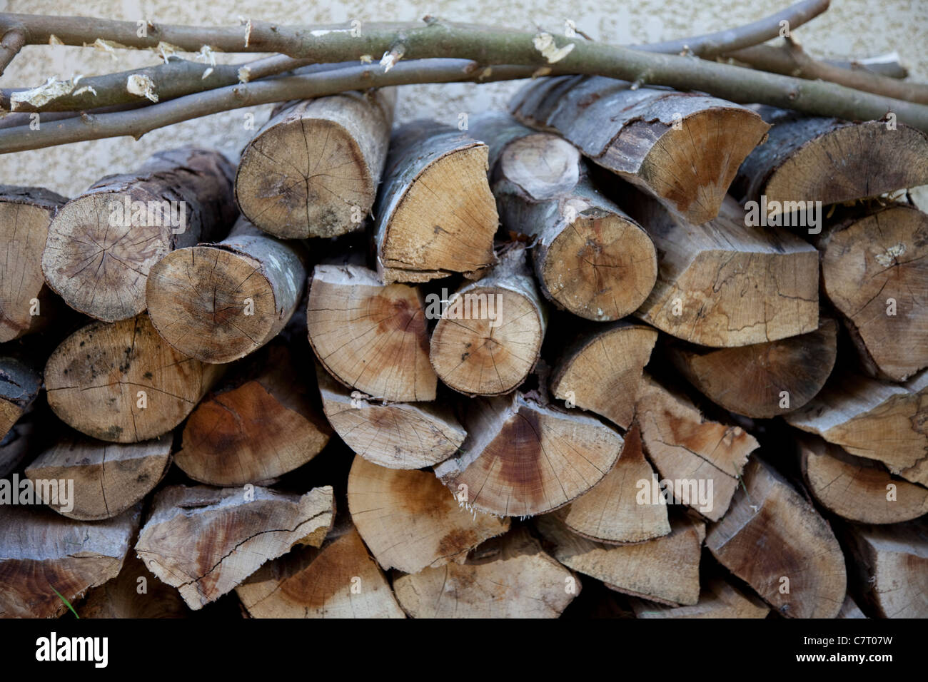 A stack of logs cut for the fire, France Stock Photo - Alamy