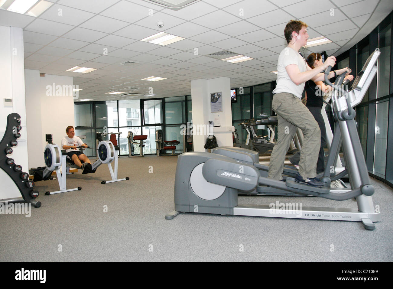 Working out at the gym Stock Photo - Alamy