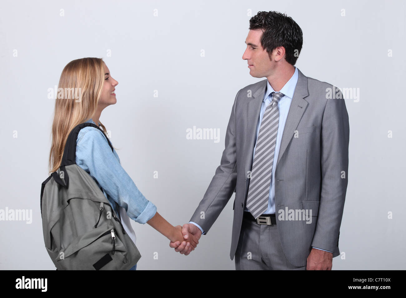 Student shaking hands with teacher hi-res stock photography and images ...