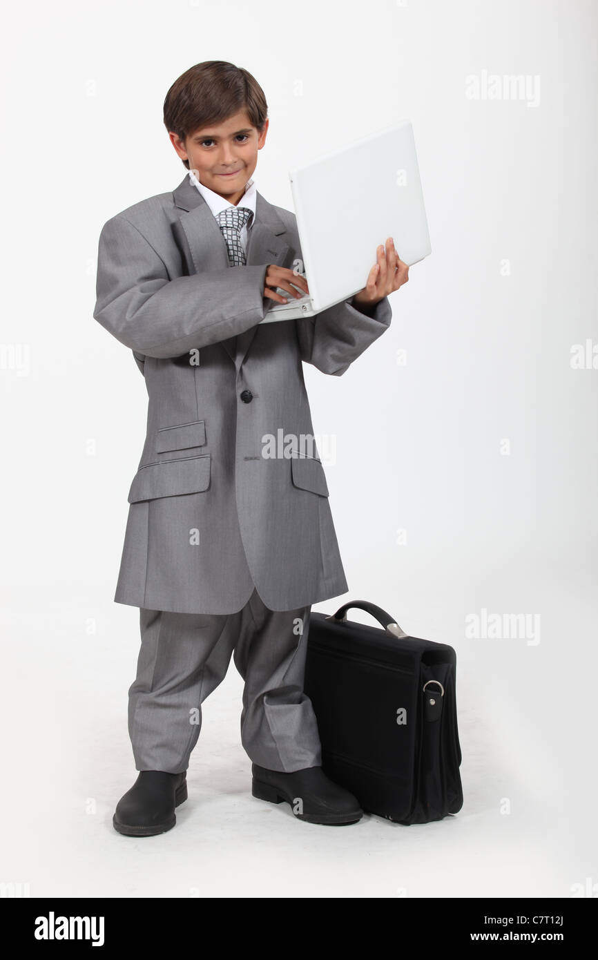 Boy dressed as a businessman Stock Photo - Alamy