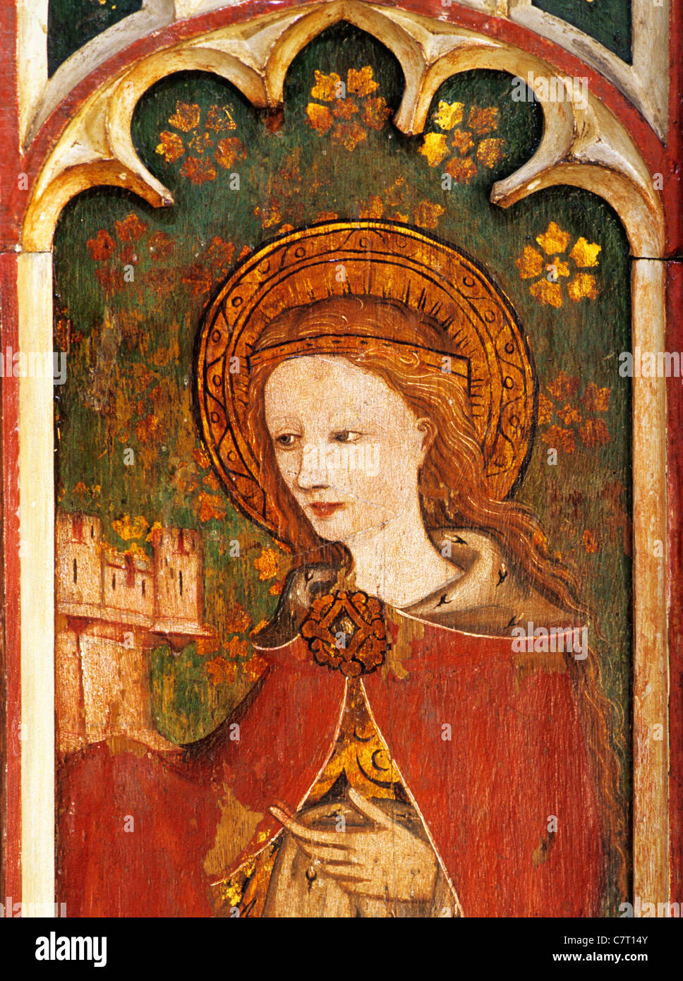 Barton Turf, Norfolk, rood screen, St. Barbara, holding a castle tower ...