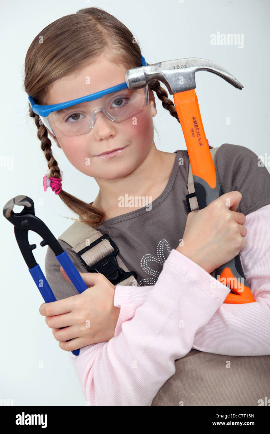 a little girl with tools Stock Photo - Alamy