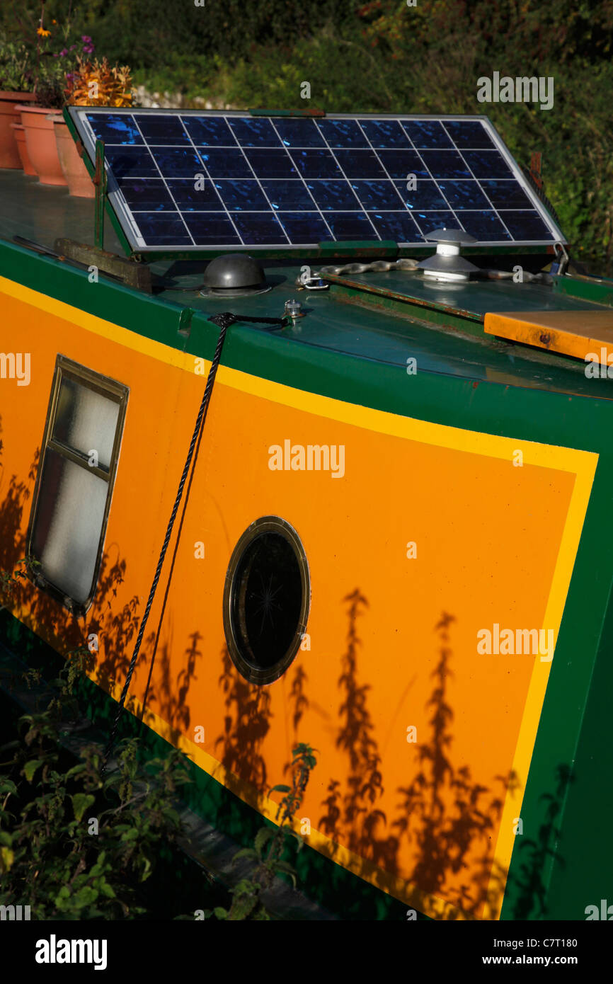 Solar panel on barge on Kennet and Avon canal, Somerset. England, UK ...