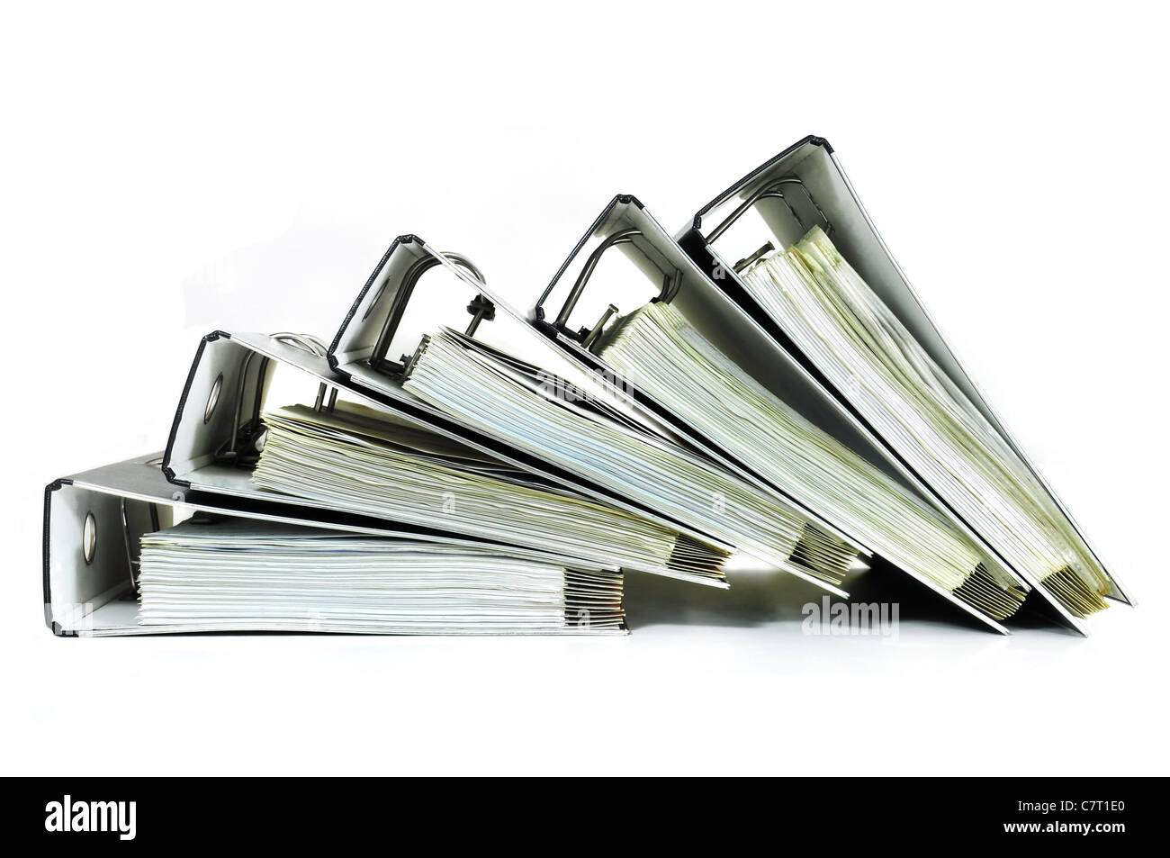 Various black colored office binders with important documents on white ...