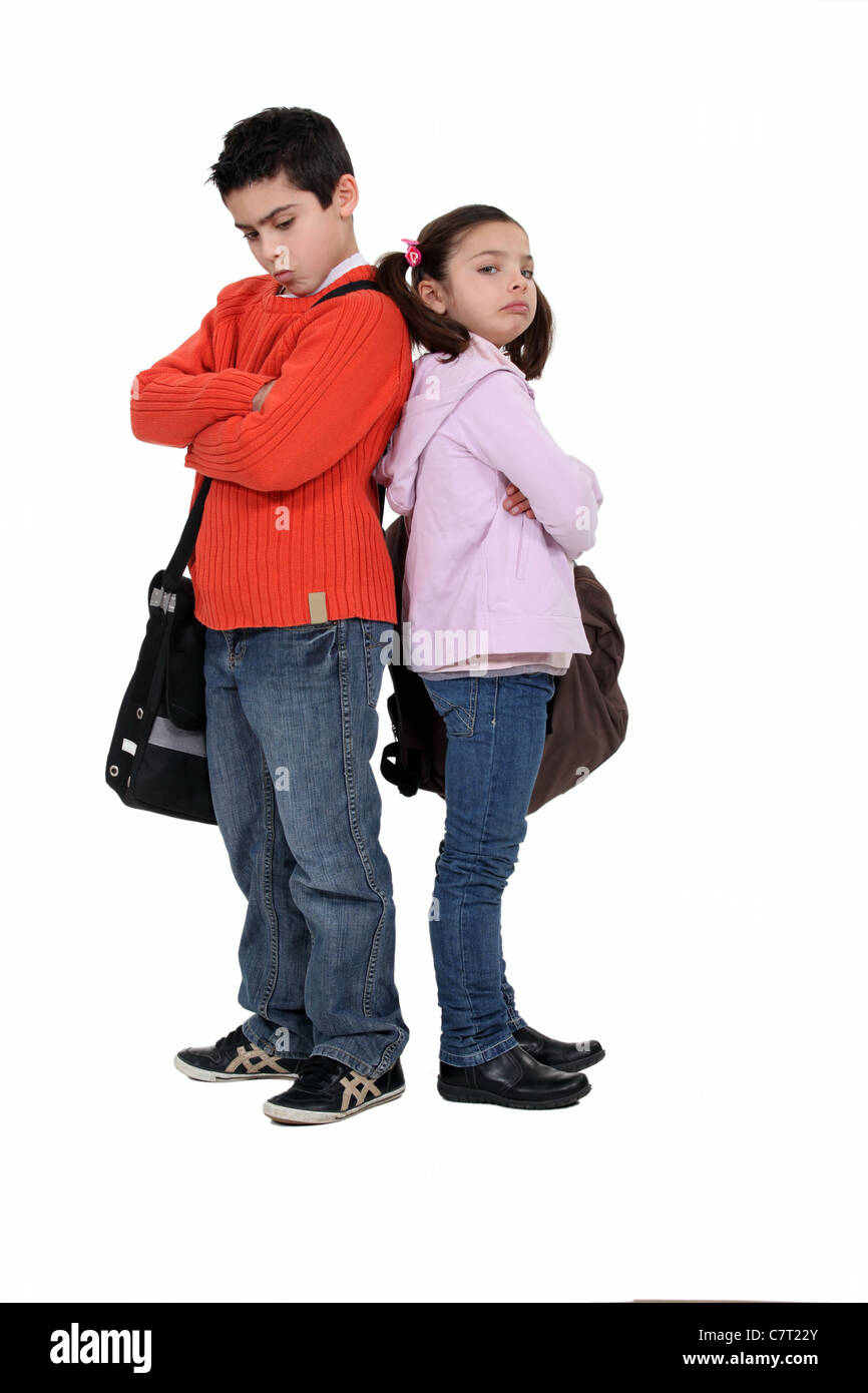 two kids sulking Stock Photo - Alamy