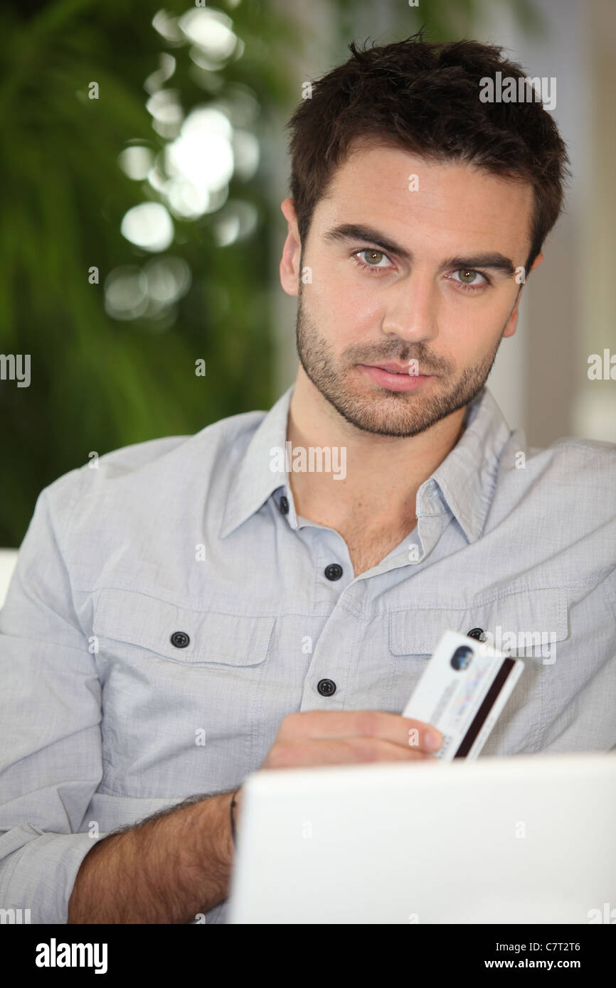Man shopping online Stock Photo - Alamy