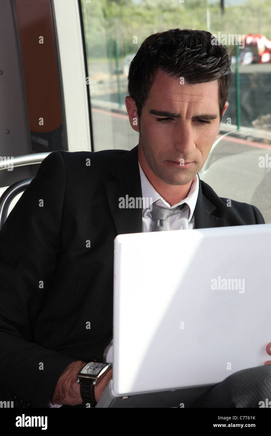 portrait of a man in public transportation Stock Photo - Alamy