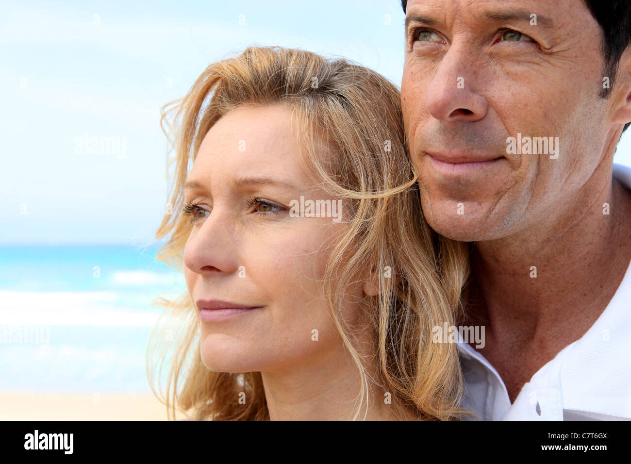 Headshot of couple by sea Stock Photo - Alamy