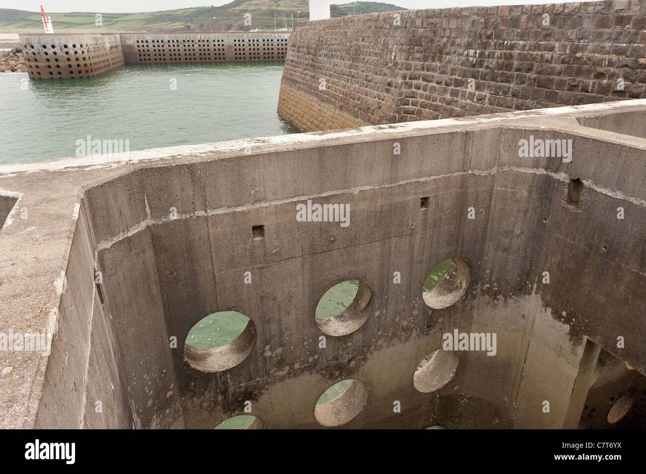 Sea defence engineering in harbor wall to dissipate ferocity of ...