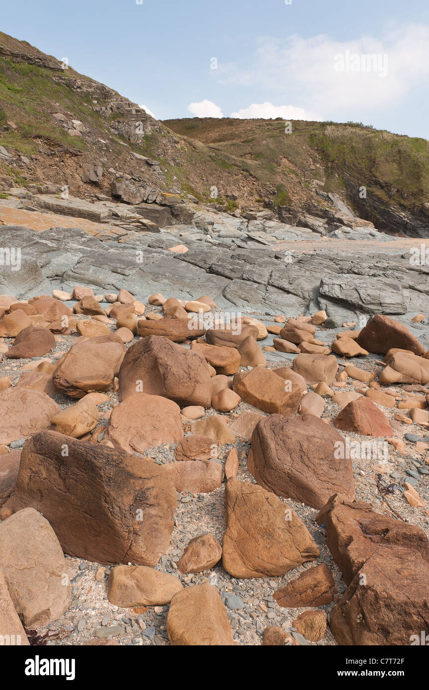 Rockfall 2m sized sandstone boulders washed smooth against schist where ...